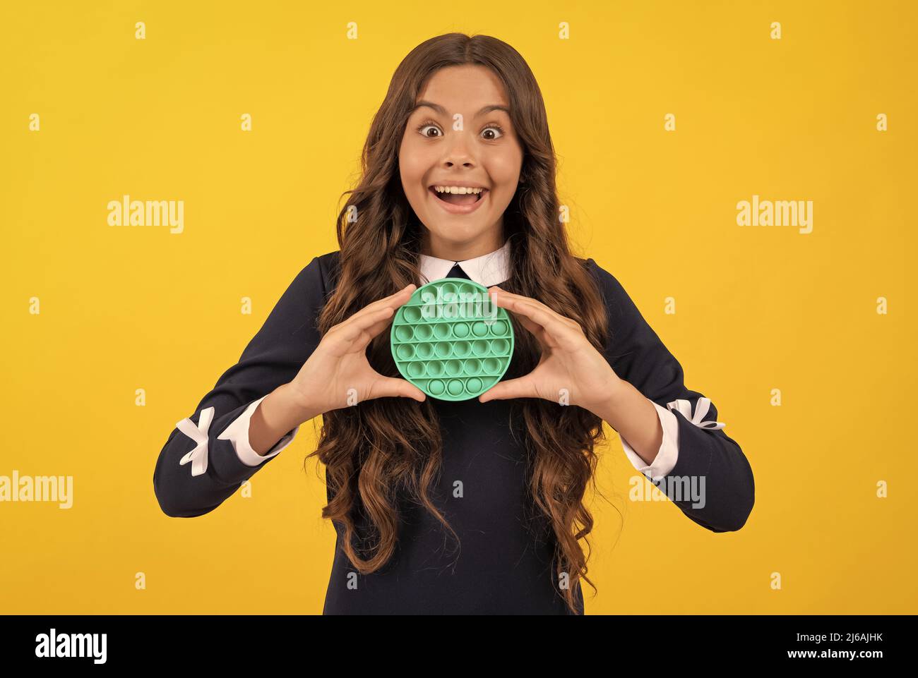 sensory fidgeting. girl with finger game. kid popping anti stress ...