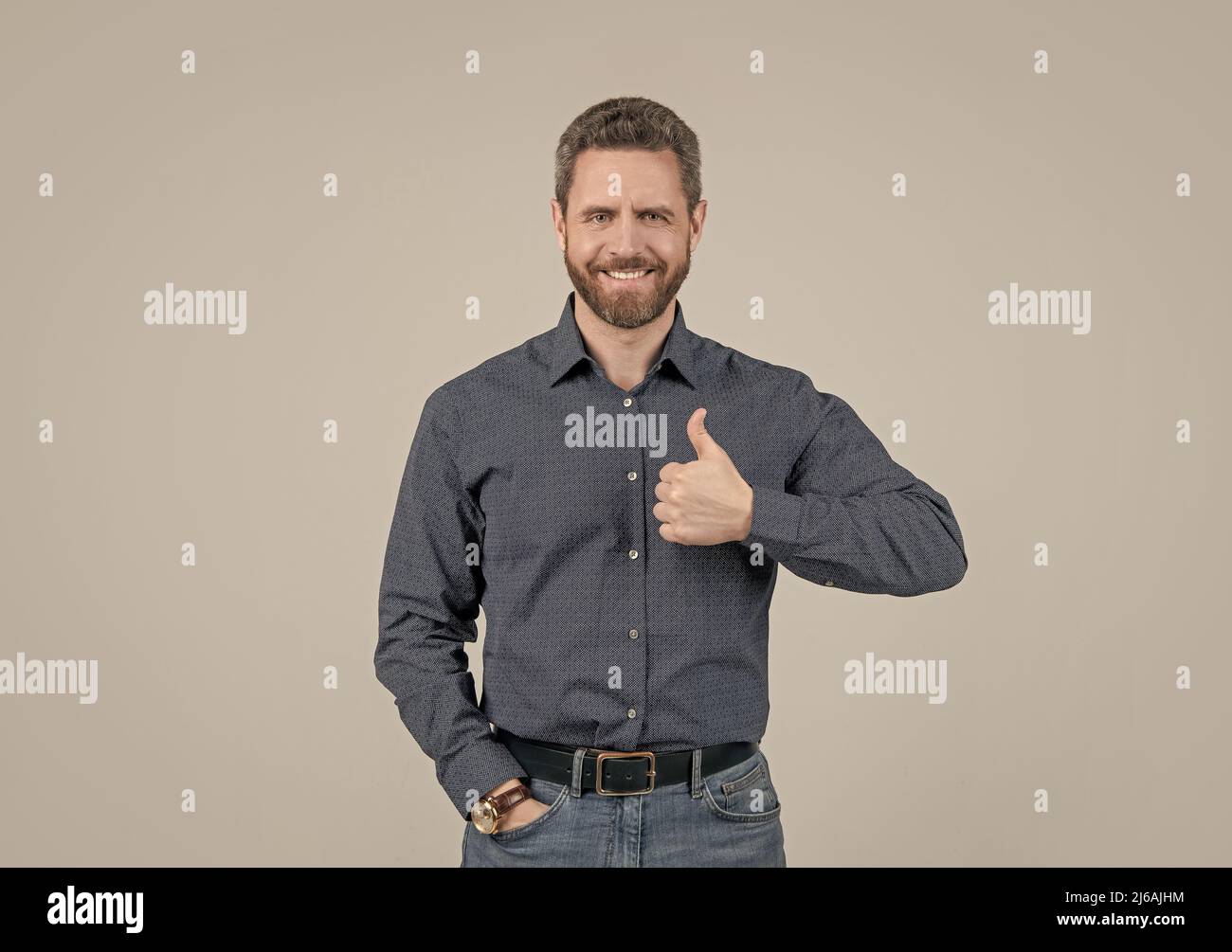 Showing approval or satisfaction. Happy man give thumbs up. Approval ...