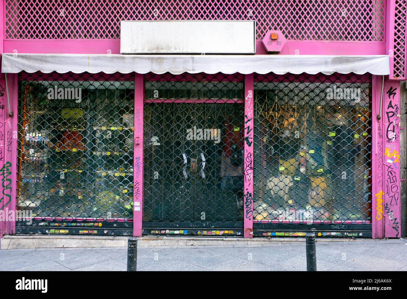 Pink Storefront with Closed Metal Security Doors, Madrid, Spain Stock ...
