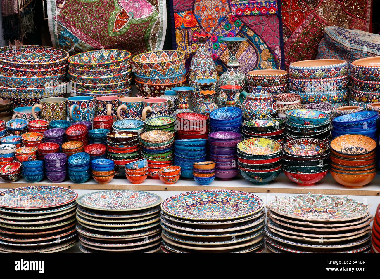 arabian style colorful ceramic plates and cutlery for sell in a street ...
