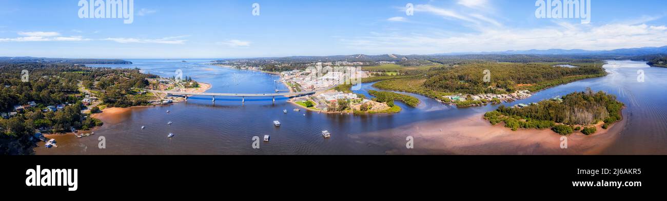 Wide aerial 180 degrees panorama over Clyde river in Batemans bay town ...