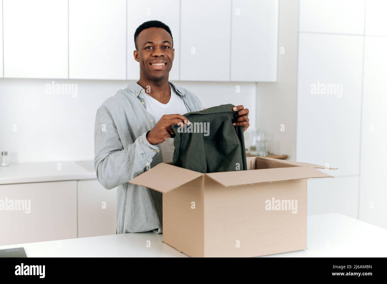 Unpacking long awaited package hi-res stock photography and images - Alamy