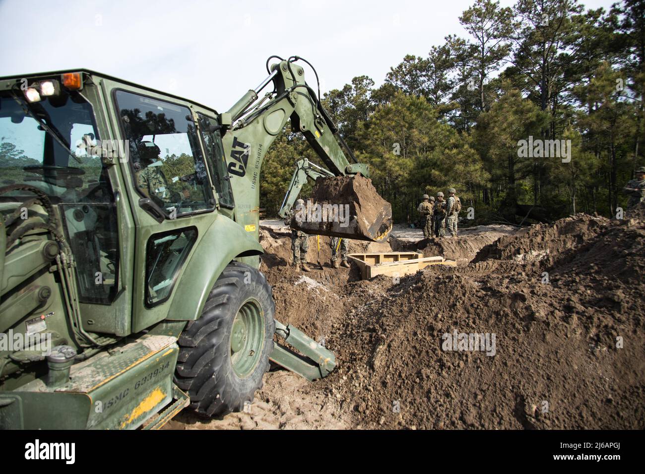 A U.S. Marine with Engineer Support Company (ESC), 8th Engineer Support ...
