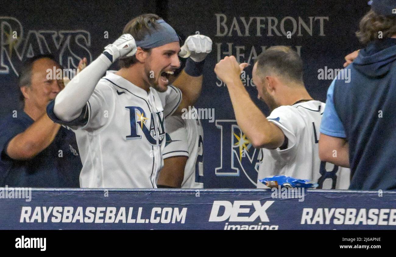 Tampa Bay Rays' Josh Lowe (L) celebrates in the dugout with Brandon ...