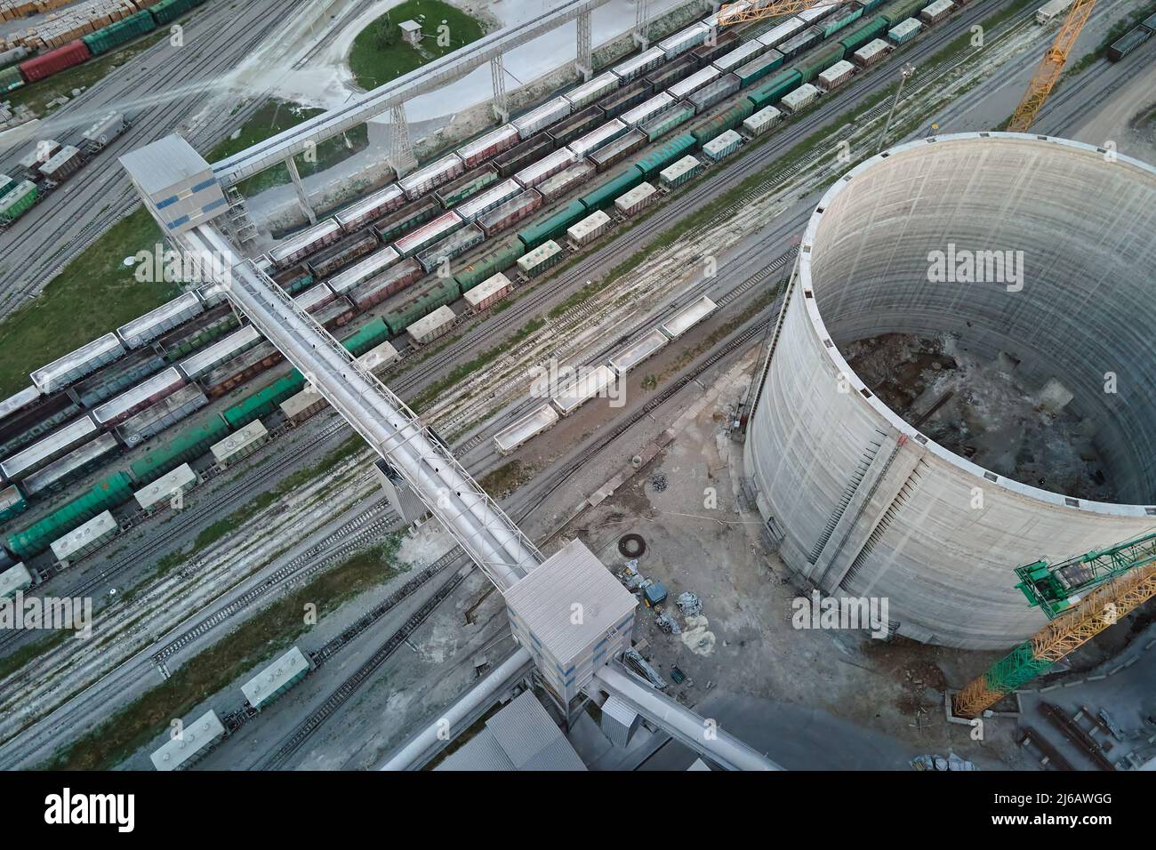 Aerial view of cargo train cars loaded with construction goods at ...