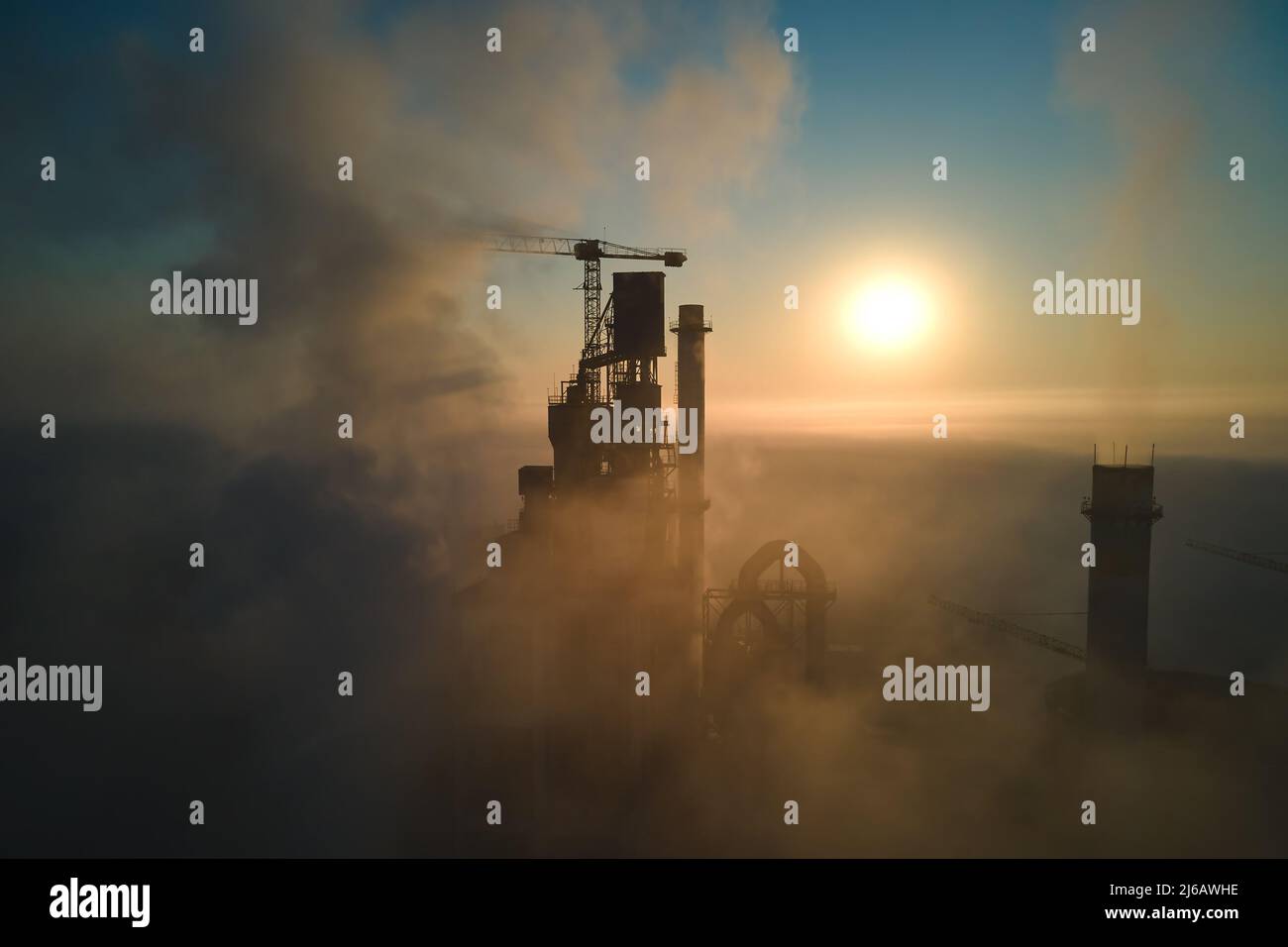 Aerial view of cement factory with high concrete plant structure and ...