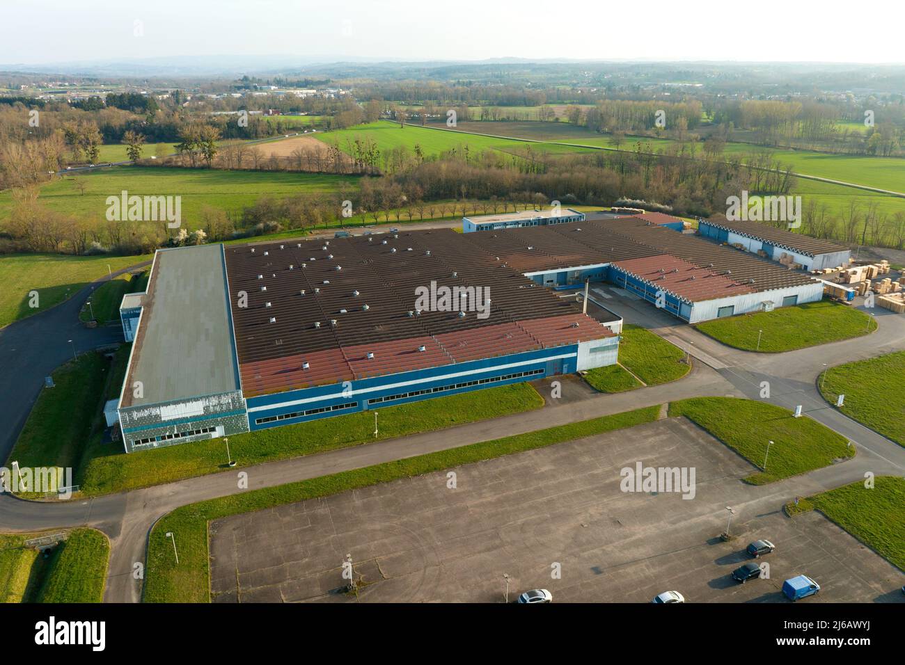 Aerial view of modern factory structure for production and distribution ...
