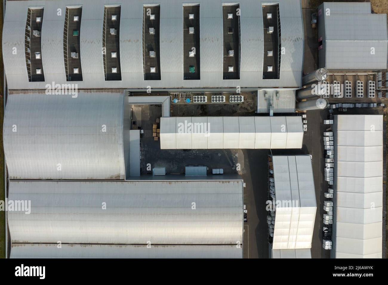 Aerial view of modern factory structure for production and distribution ...
