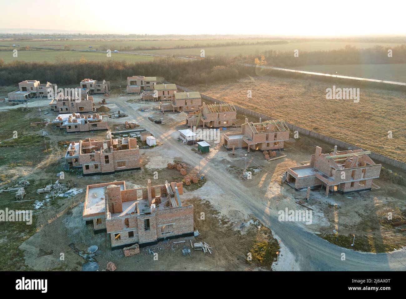Aerial view of residential houses under construction in rural suburban ...