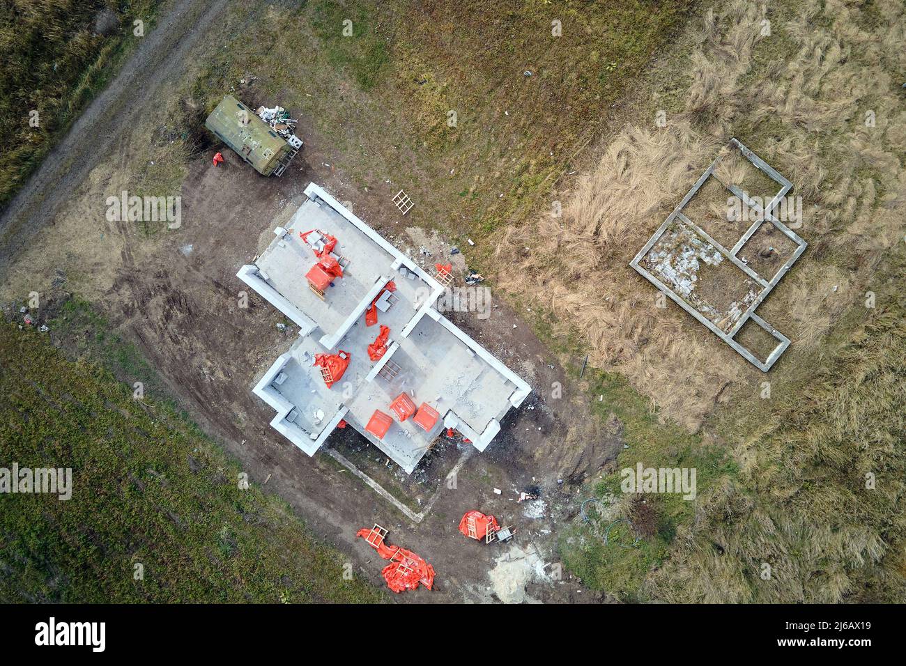 Aerial view of unfinished frame of private house foundation under ...