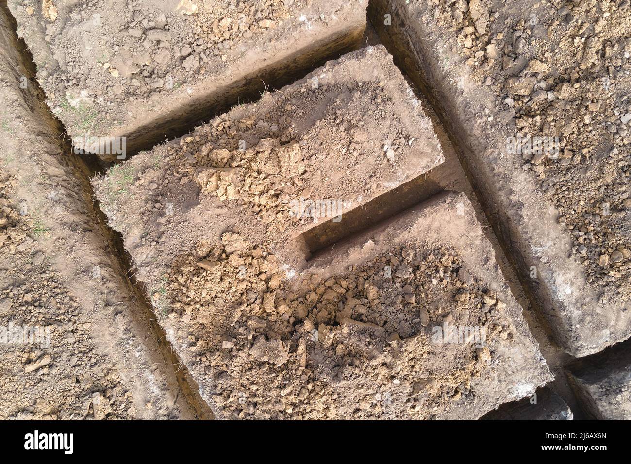 Dug out trench for building works of new house concrete foundation on ...