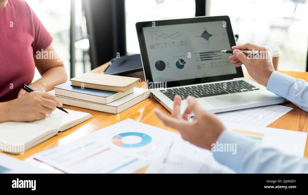 Business Negotiation Concept The Two Realtors Negotiating About Agreement Of Property Contract