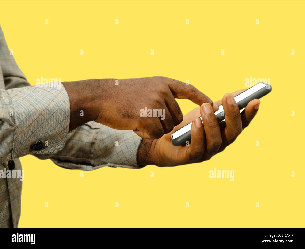 male hand touching phone screen on yellow background Stock Photo - Alamy