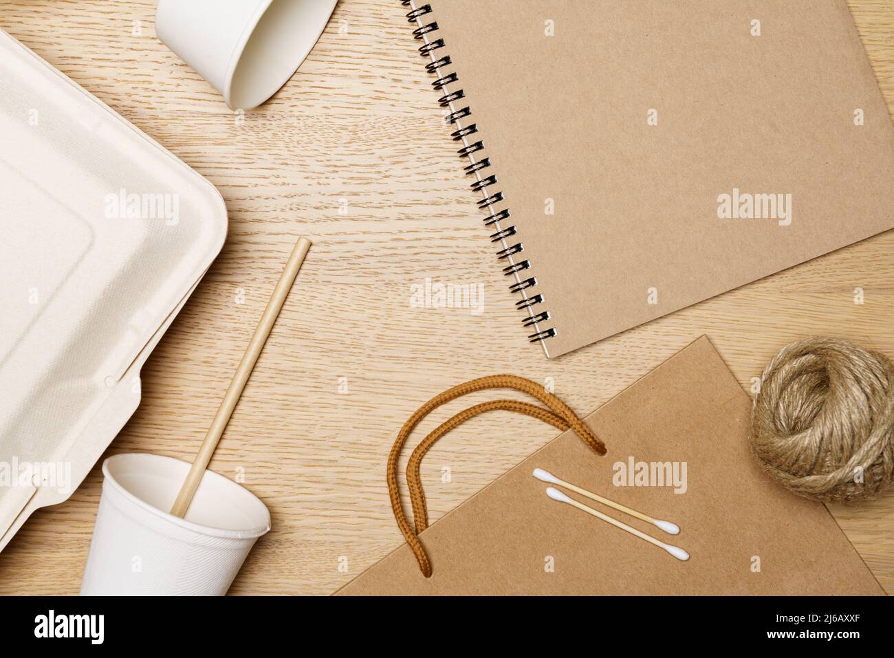 Eco friendly concept, Food box paper cup paper bag notebook and jute ...