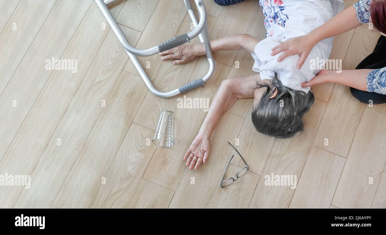 Elderly woman falling down at home ,hearth attack Stock Photo - Alamy