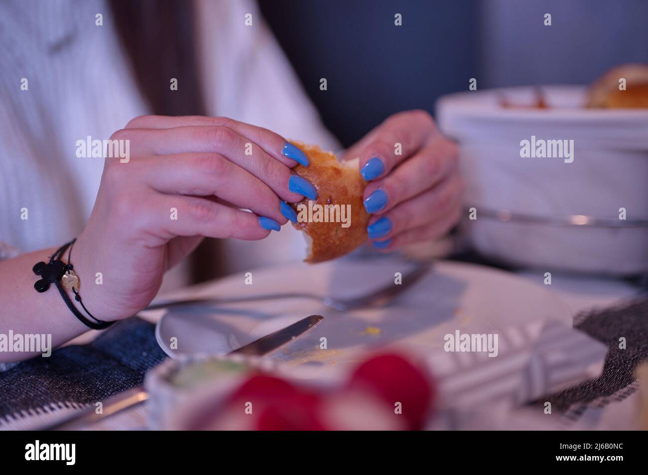 Female hands holding bread hi-res stock photography and images - Alamy