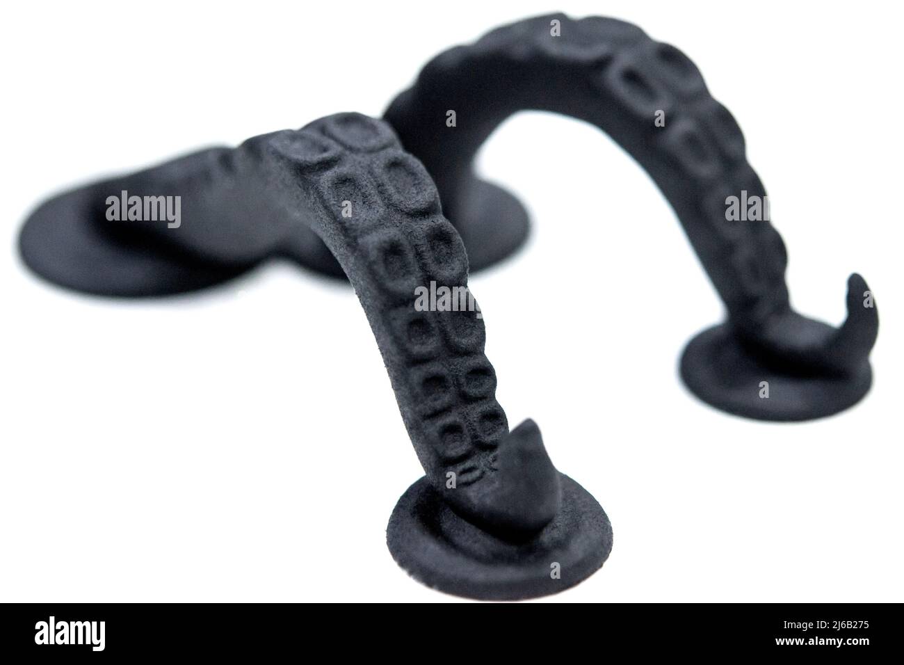 Models printed on 3D printer. Black objects printed on 3D printer made ...