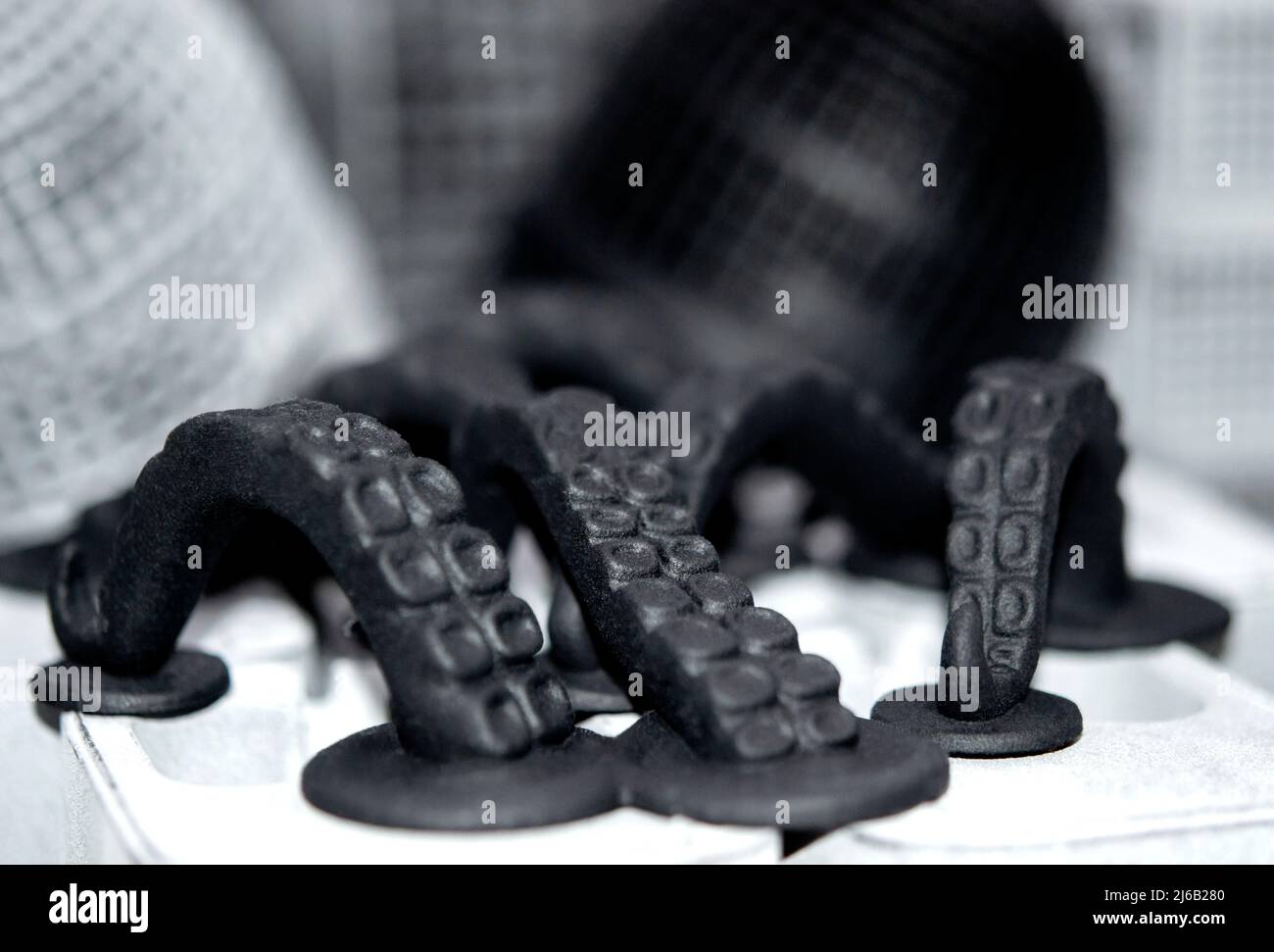 Models printed on 3D printer. Black objects printed on 3D printer made ...