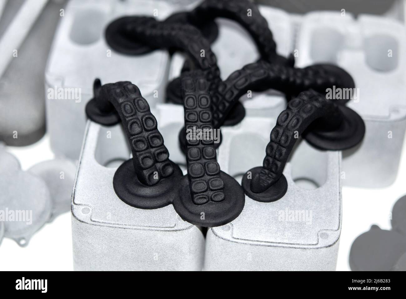 Models printed on 3D printer. Black objects printed on 3D printer made ...