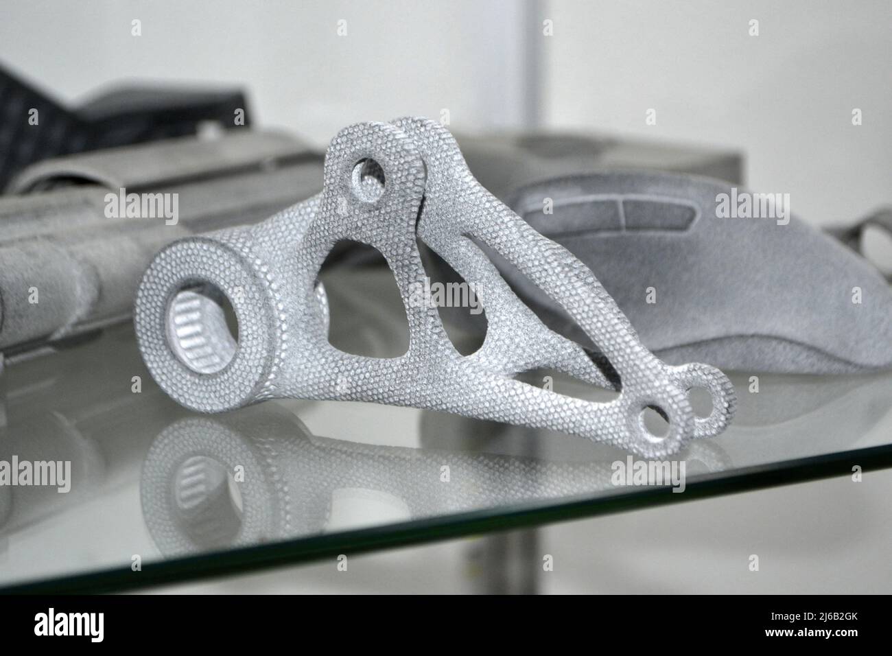 Models printed on 3D printer. Gray objects printed on 3D printer made ...