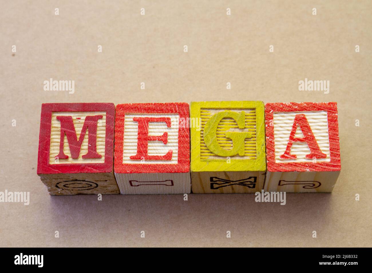 The term mega visually displayed on a clear background with copy space ...