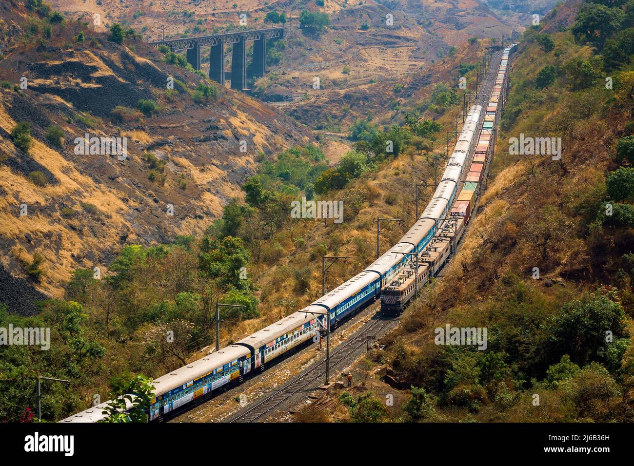 Indian railway track green tunnel hi-res stock photography and images ...
