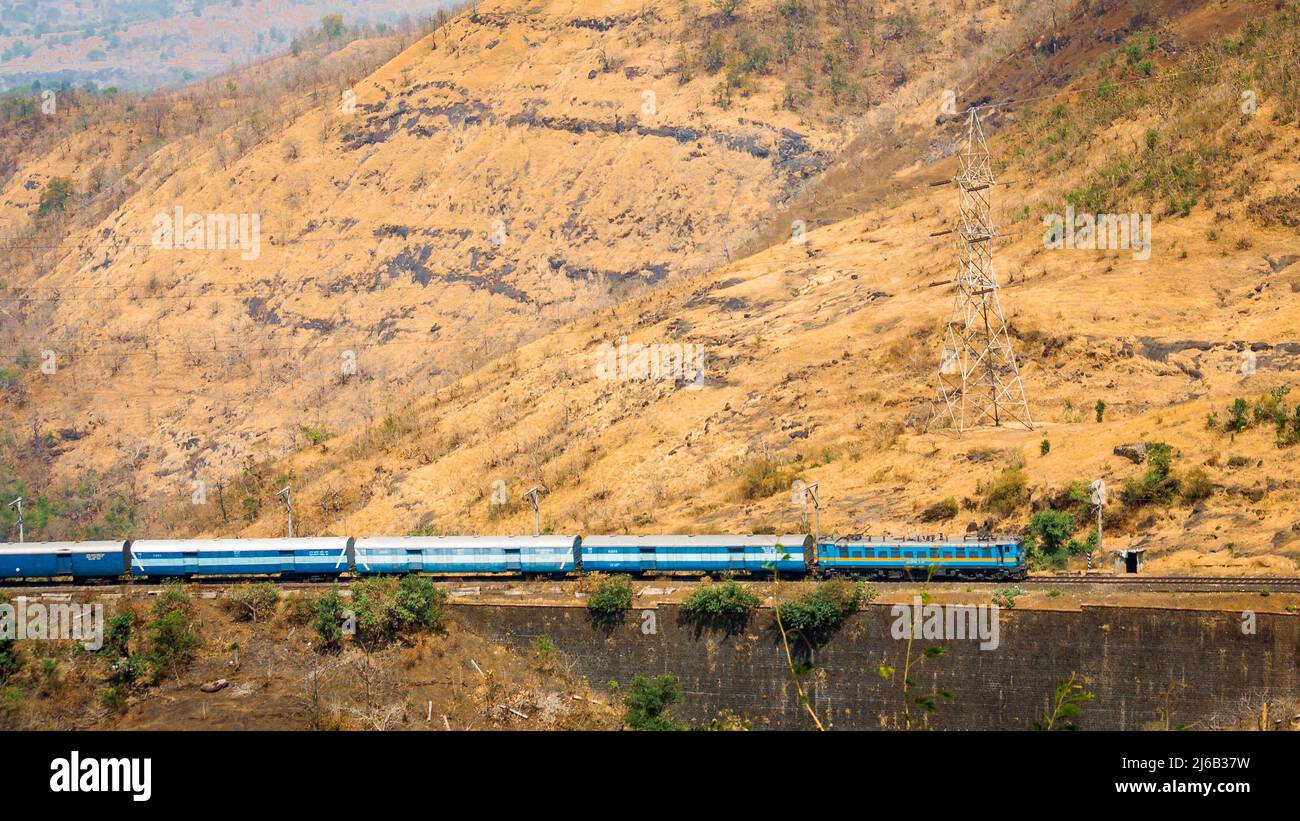 Indian railway track green tunnel hi-res stock photography and images ...