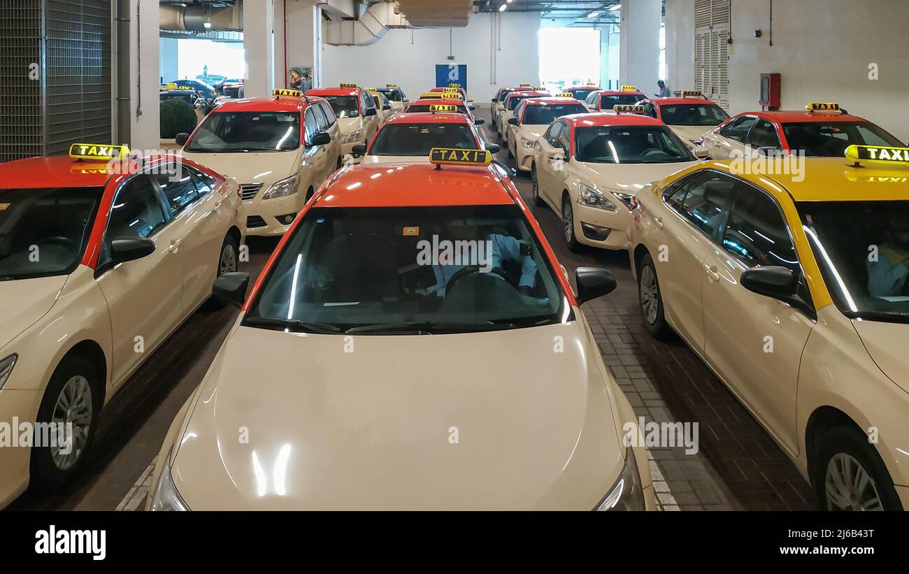 Dubai, UAE, August 20, 2019. Mani taxi cars parked near a shopping mall ...