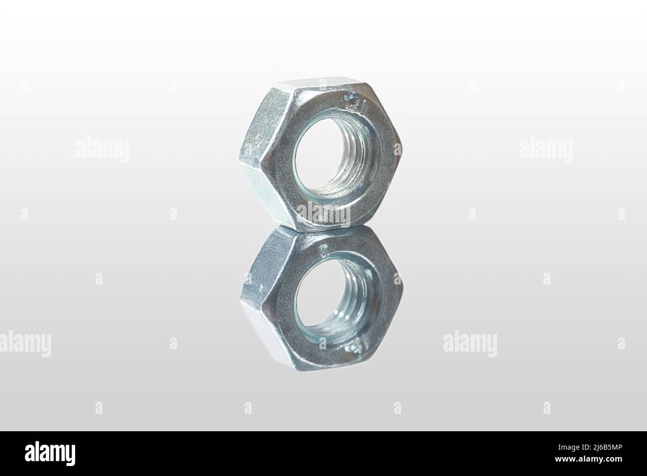 Big nut and its reflection. Isolated on gradient background, clipping ...