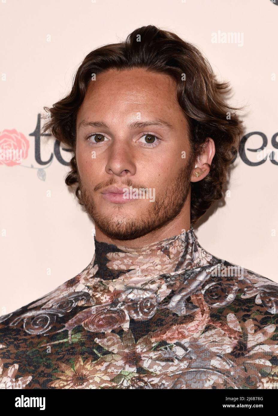 Tyson French walking on the red carpet at the Cote de Roses' Campaign ...