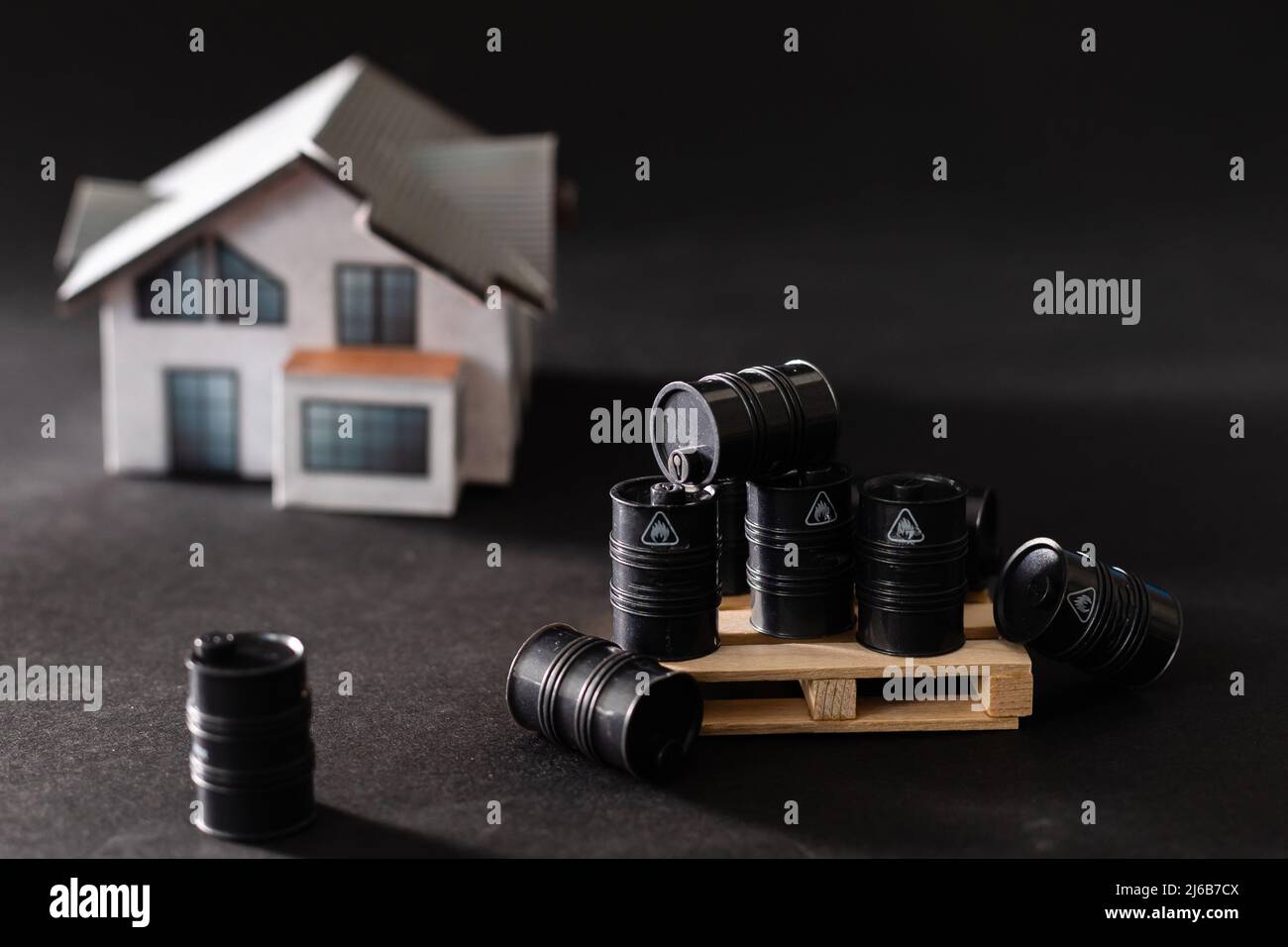 tin barrels and house mockup Stock Photo - Alamy