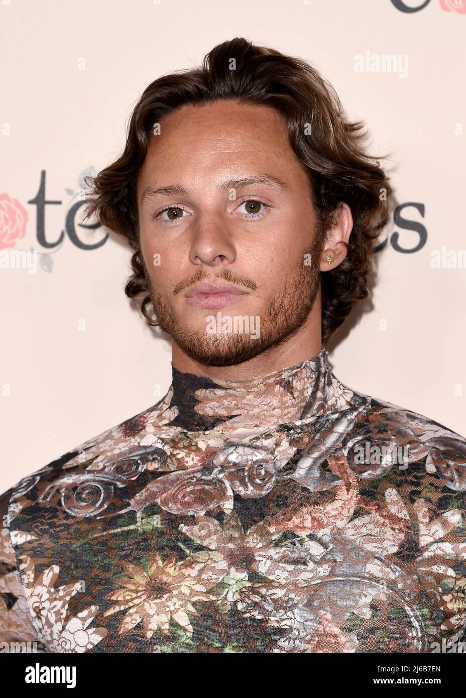 Tyson French walking on the red carpet at the Cote de Roses' Campaign ...