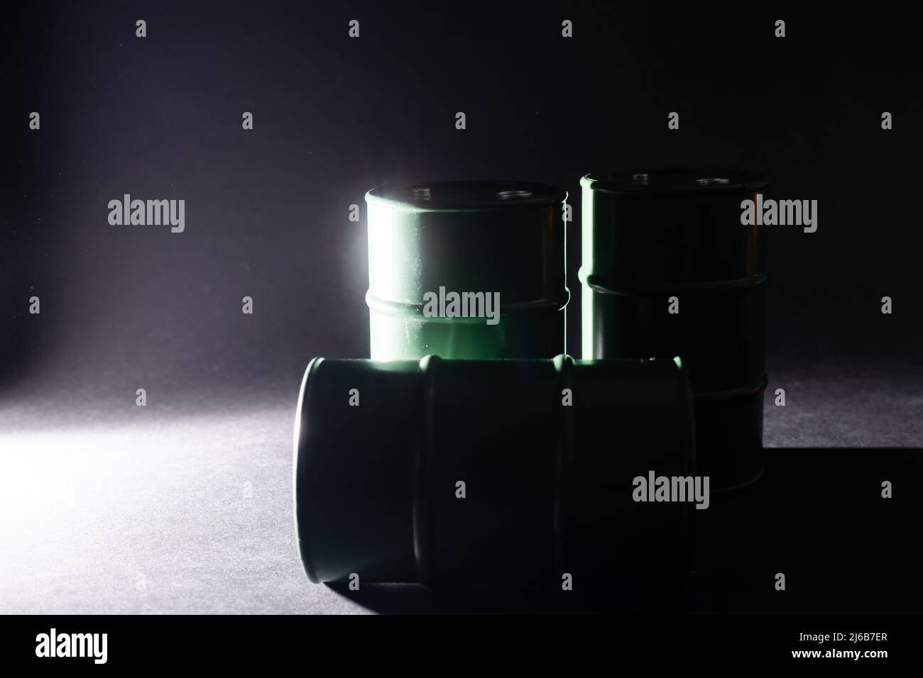 tin barrels on black background isolated close up, one round oil drum ...
