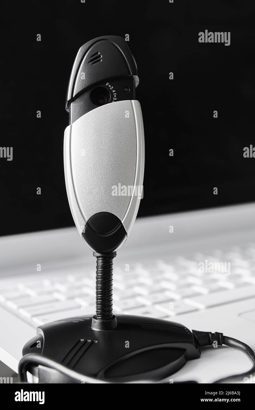 Removable web camera connected to a laptop with usb Stock Photo - Alamy
