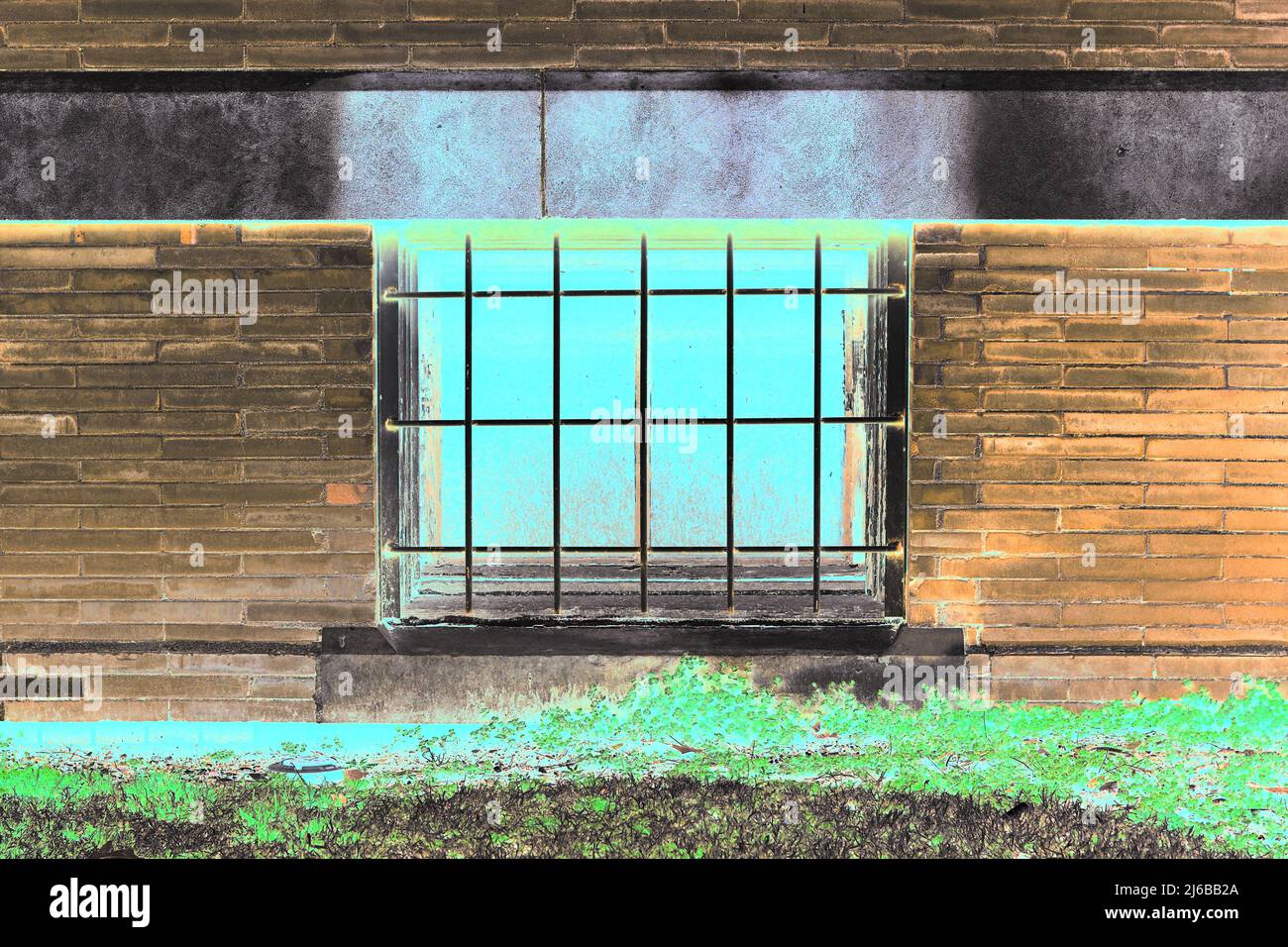 Vintage inner city basement window with a metal steel security grate ...