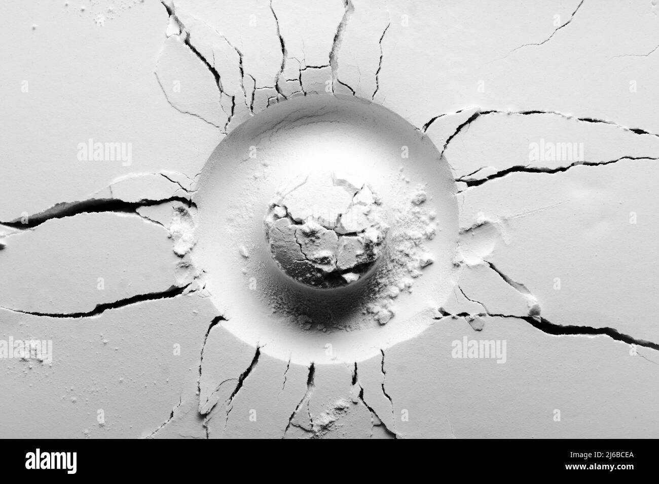Imprint of a round shape with cracks Stock Photo - Alamy