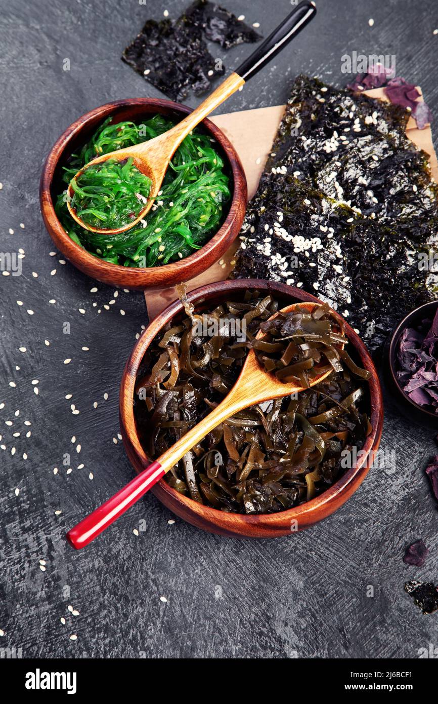 Seaweed assortment on fark background. Healthy snacks. Top view, flat ...
