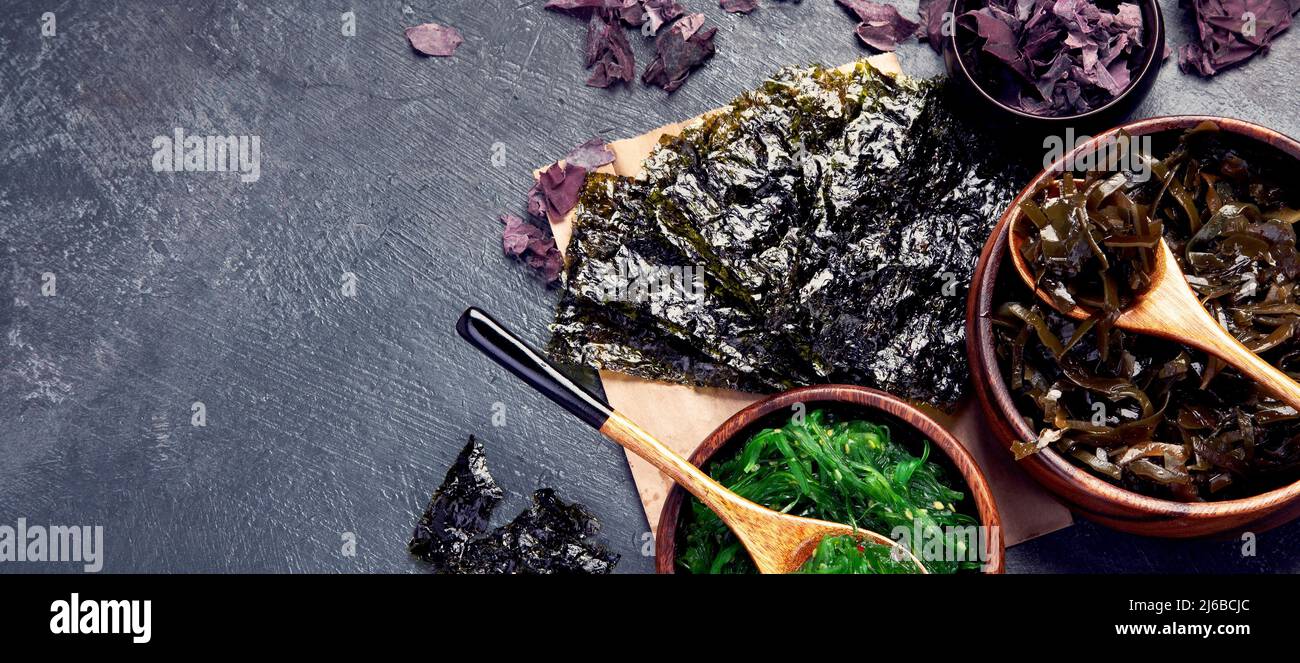 Seaweed assortment on fark background. Healthy snacks. Top view, flat ...