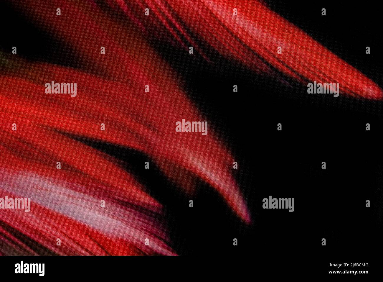Abstract background in black and red. The red parts have a soft ...