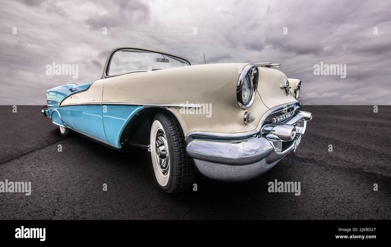 Side view of a classic american car from the fifties. The car is in ...