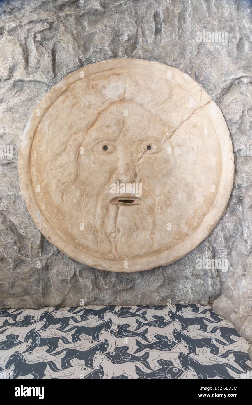 Mouth of truth sightseeing in Rome, Italy. Historical sculpture made of ...