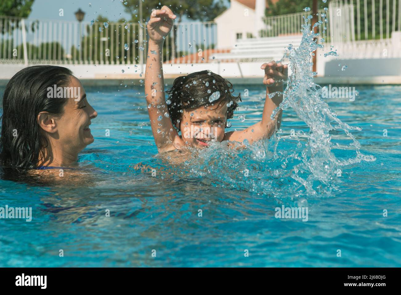 Child splashing summer hi-res stock photography and images - Alamy