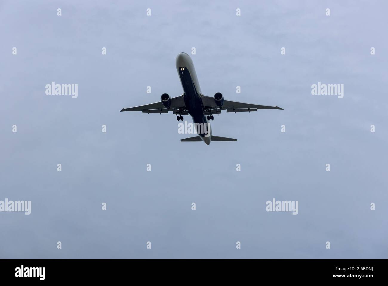 An aircraft on final approach for landing Stock Photo - Alamy