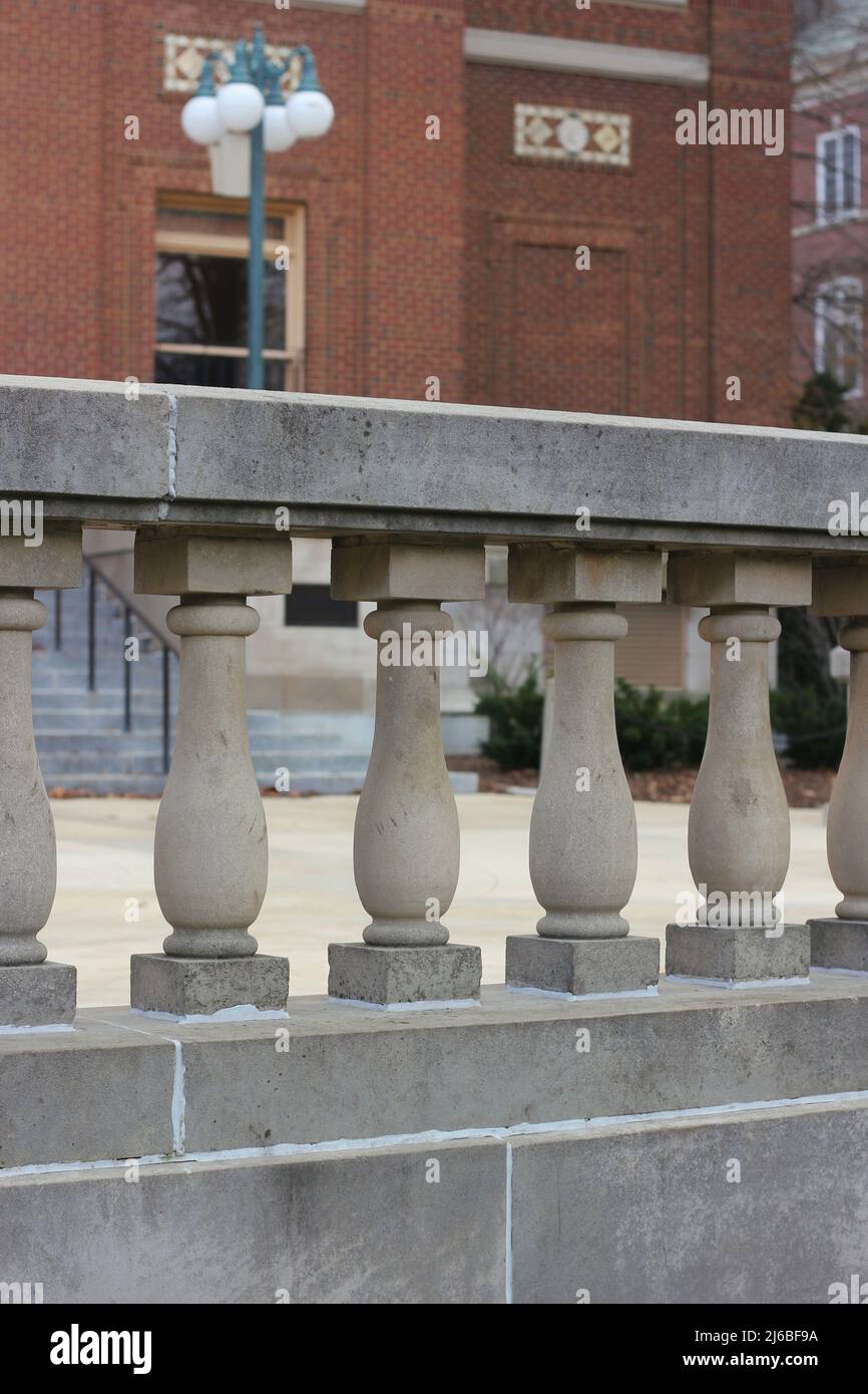 Natural stone marble balustrade of columns in front of a traditional ...