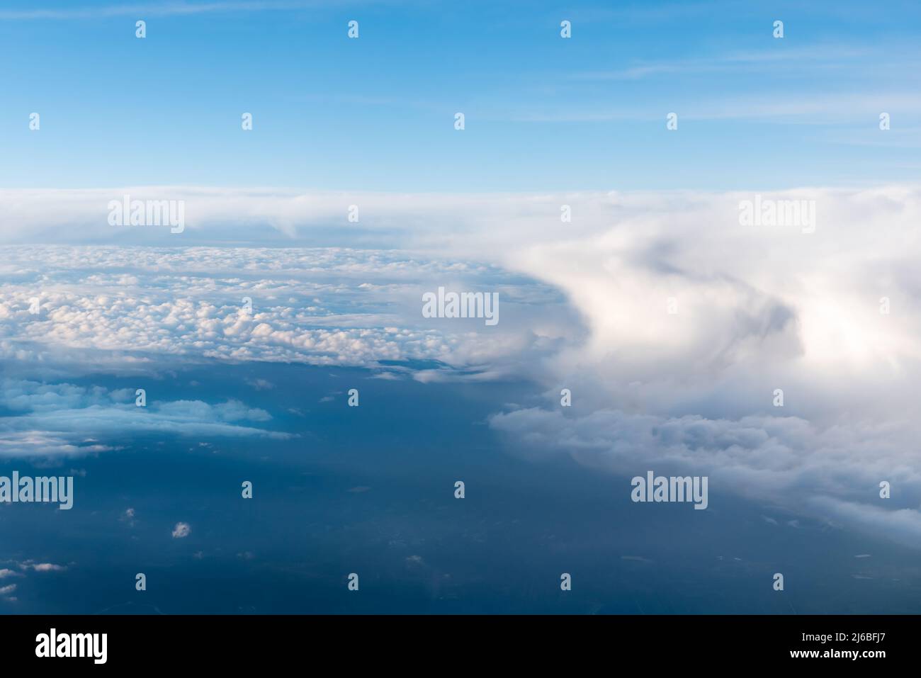White cumulus clouds on clear blue sky background closeup, overcast ...