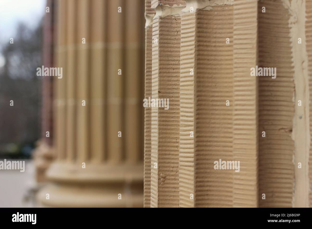Carved grooves in natural stone on a building column Stock Photo - Alamy