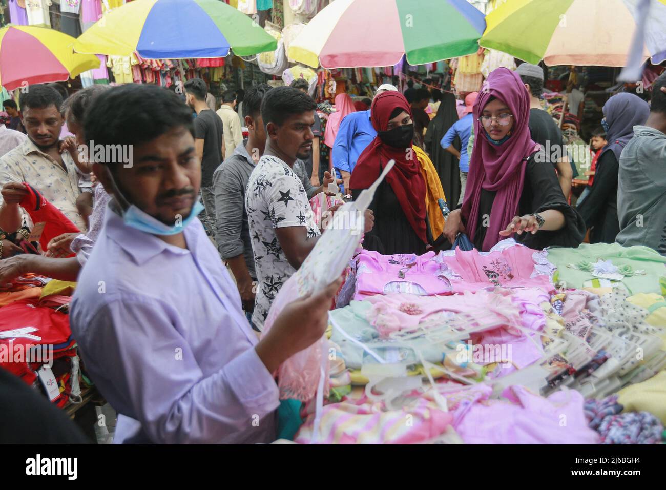 City dwellers thronged into shopping malls and makeshift shops on ...