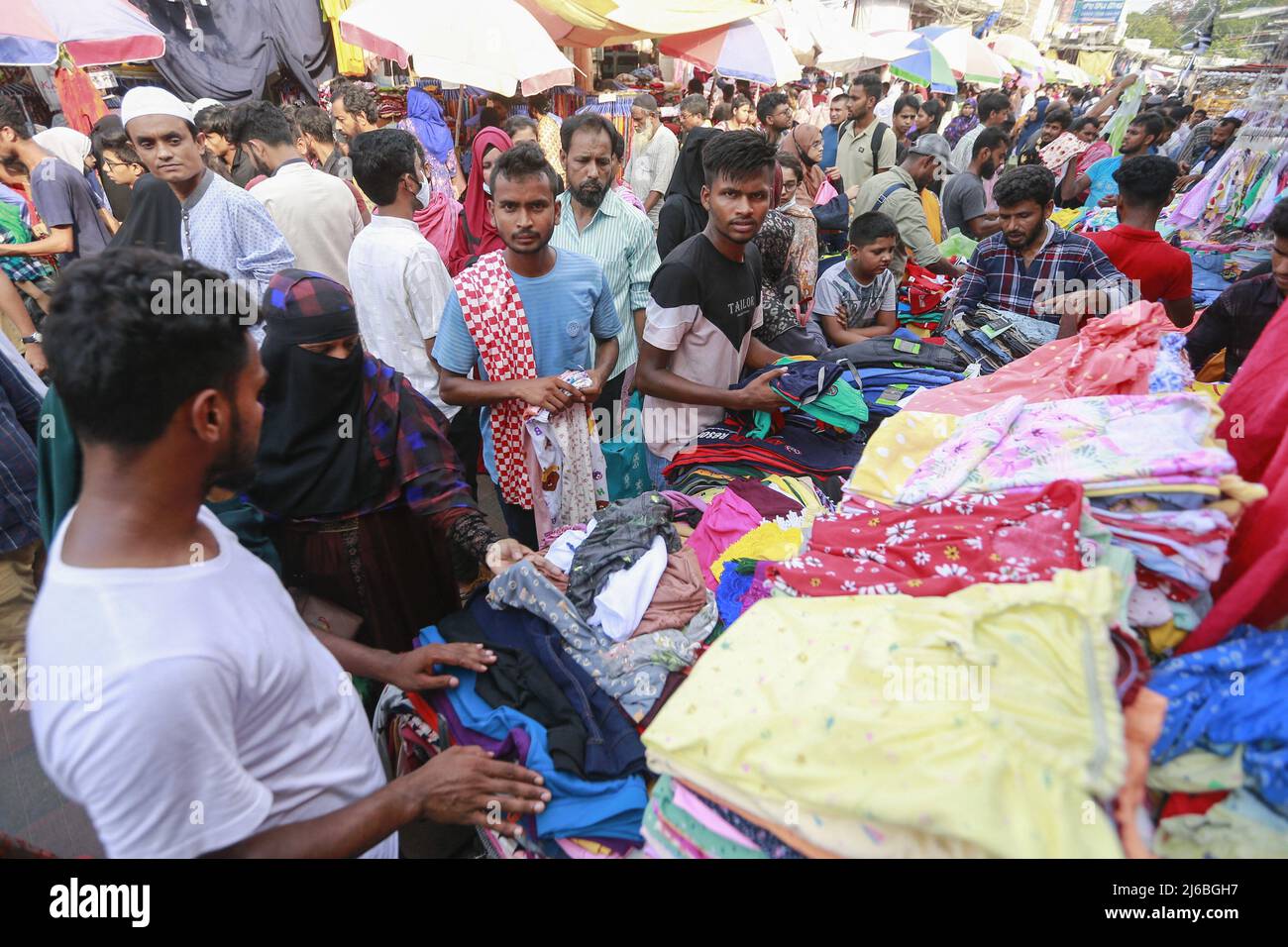 City dwellers thronged into shopping malls and makeshift shops on ...