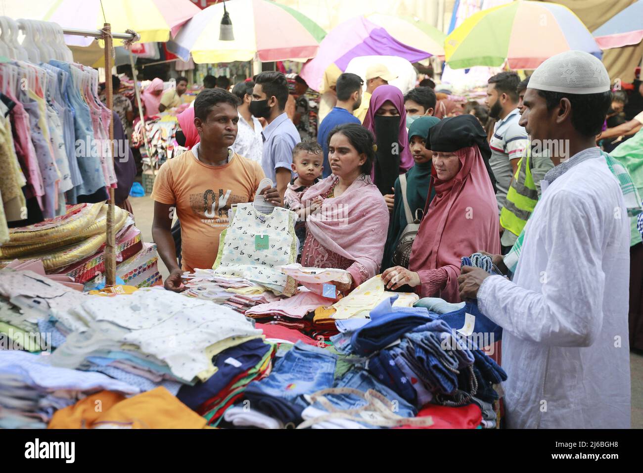 City dwellers thronged into shopping malls and makeshift shops on ...