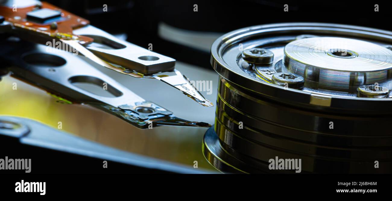 Macro Close up of inside of magnetic Hard Disc Drive with mirror ...